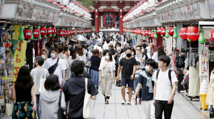 Japan reports over 1,000 infections for 4th day as virus resurges